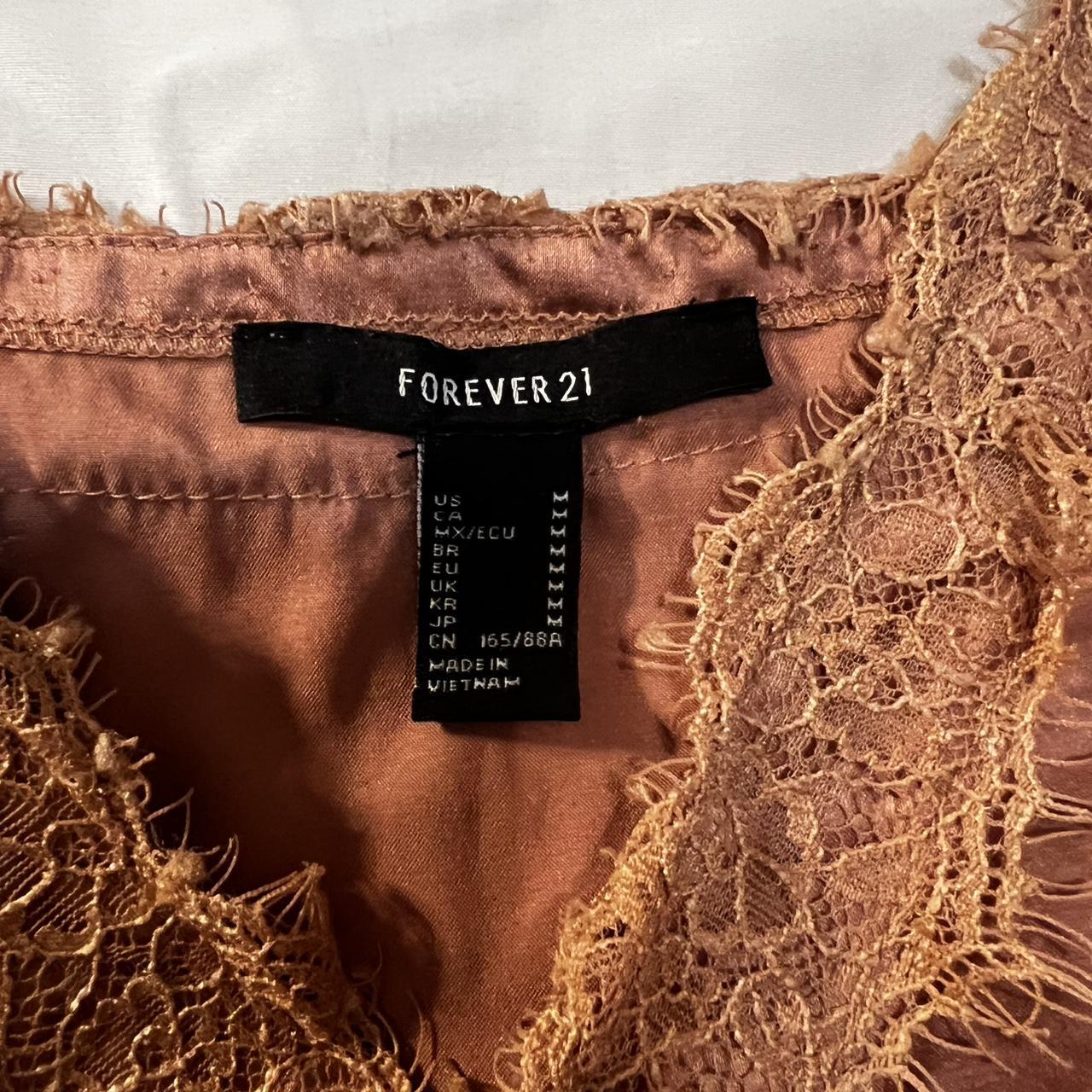 Copper colored lace cami top with adjustable straps... | Depop