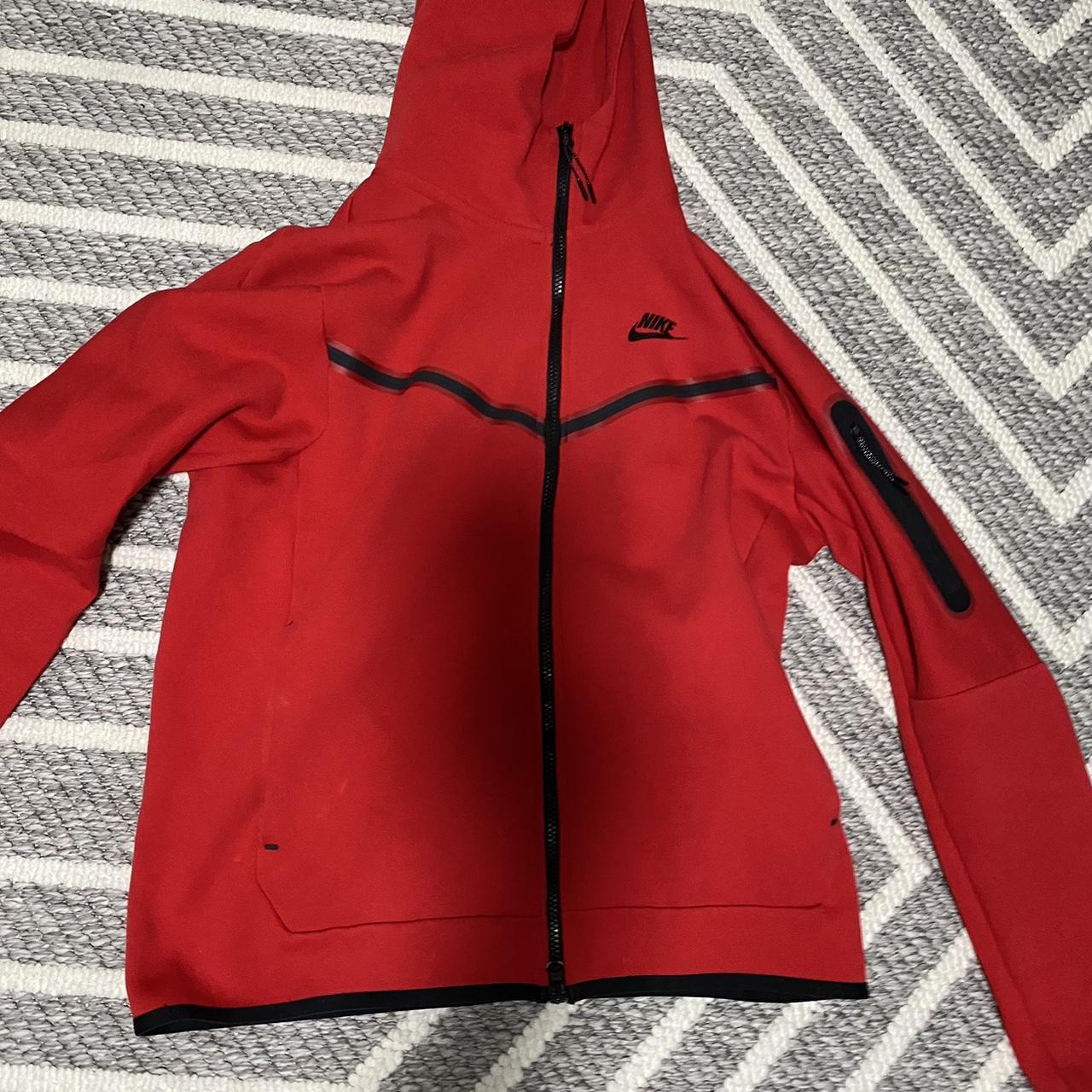 Red Nike tech small stain on hoodie - Depop