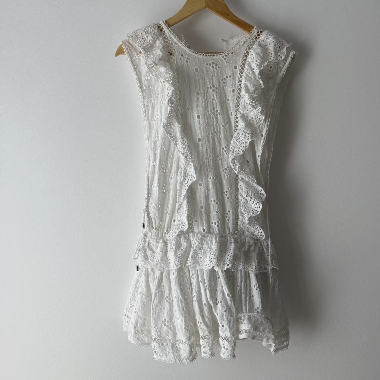 White lace ruffle mini dress with tie back... | Depop