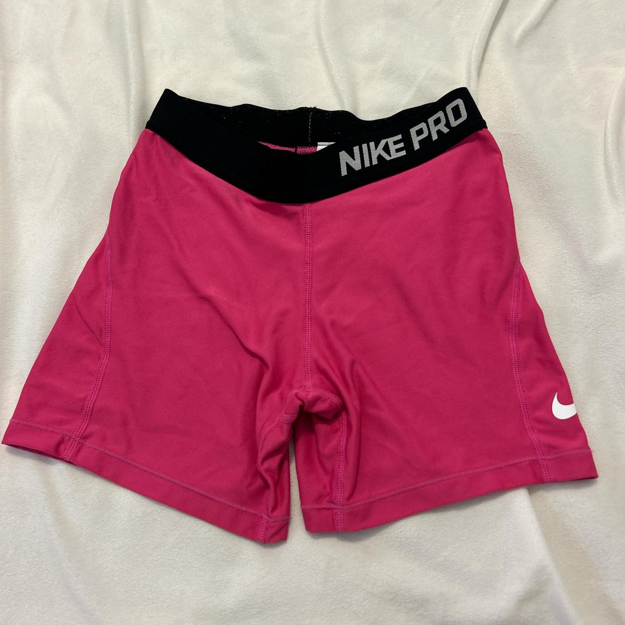 Pink Nike Pro’s. Size kids L. - Depop