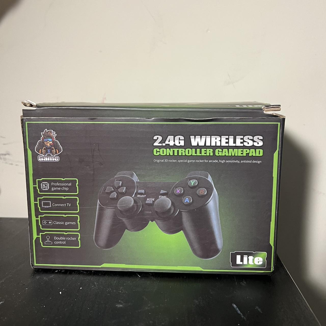 Black 2.4G wireless controller gamepad with game... | Depop