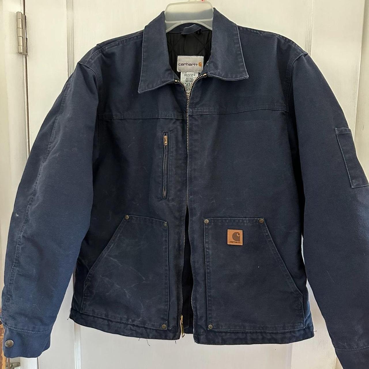 Carhartt navy blue jacket with a distressed look... - Depop