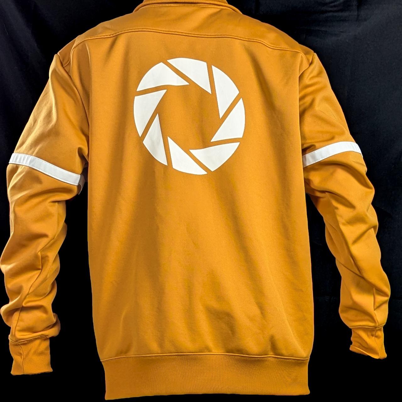 Orange portal "aperture science test subject" track... - Depop