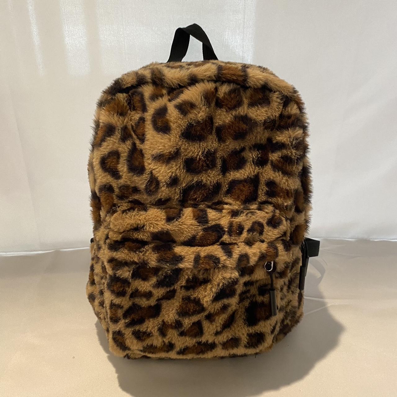 Leopard print faux fur backpack - brown and tan... | Depop