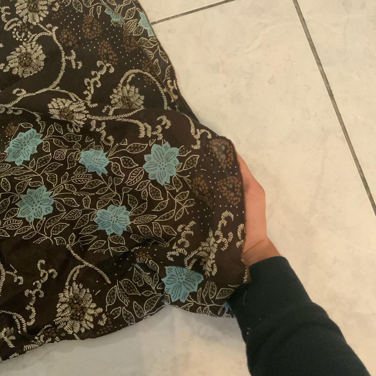 Brown and blue floral mini skirt -transparent,... - Depop