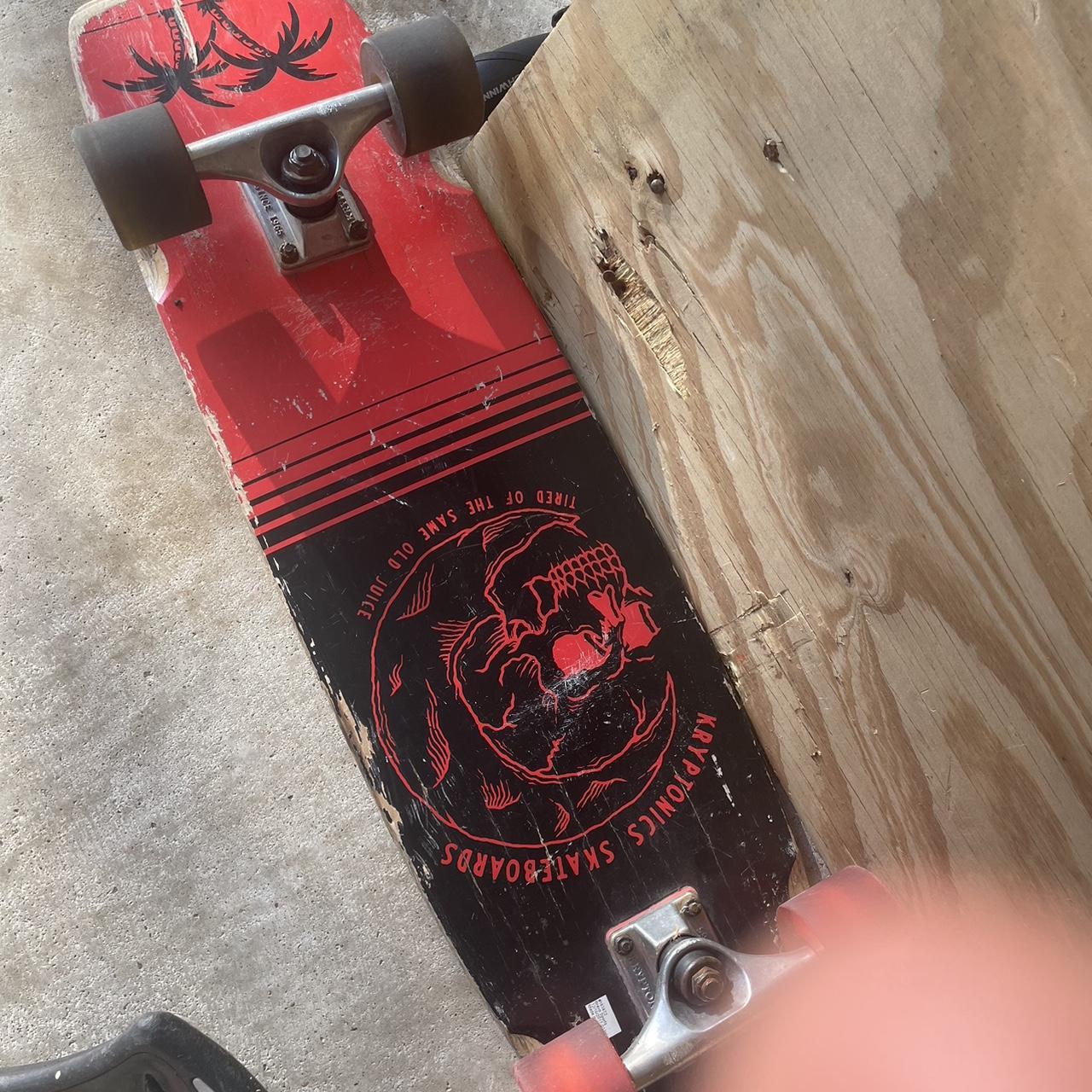 Red and black skateboard #skateboarding still... - Depop
