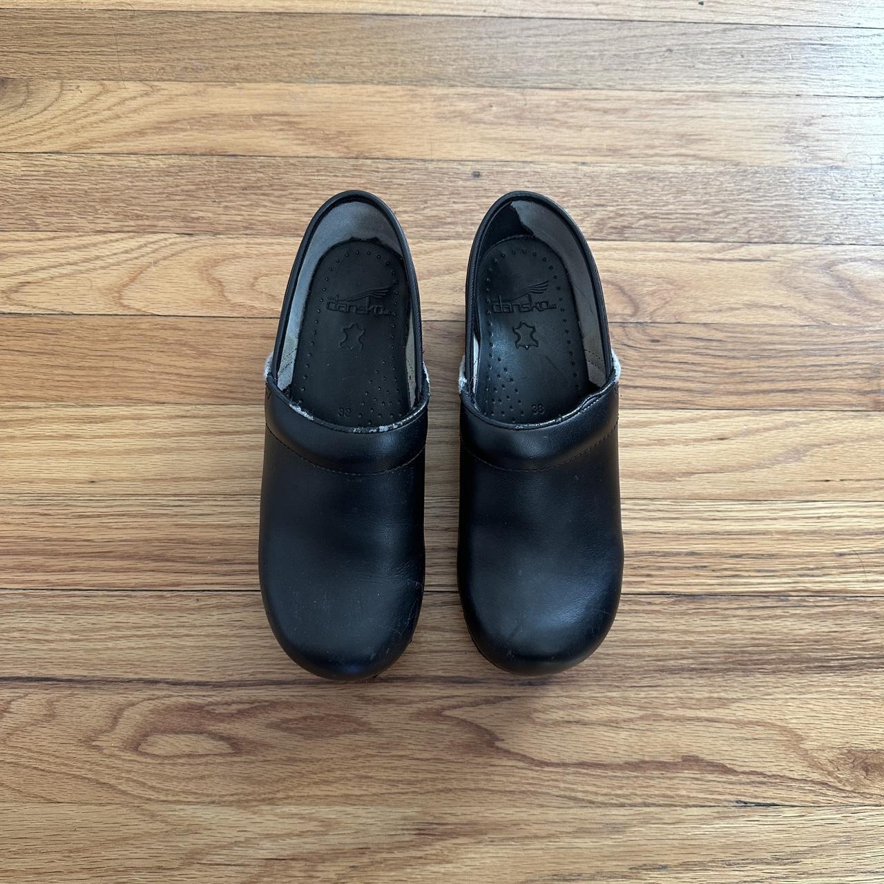 Dansko Women's Black Clogs | Depop