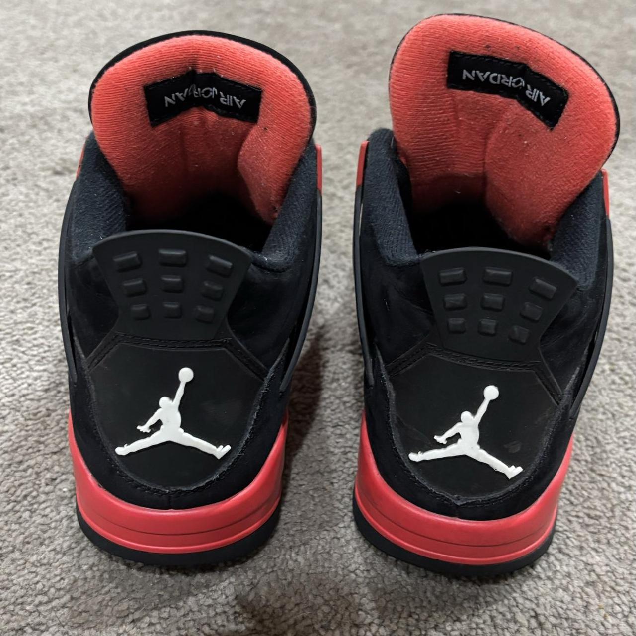 Red thunder 4s worn a few times with fading on the... - Depop