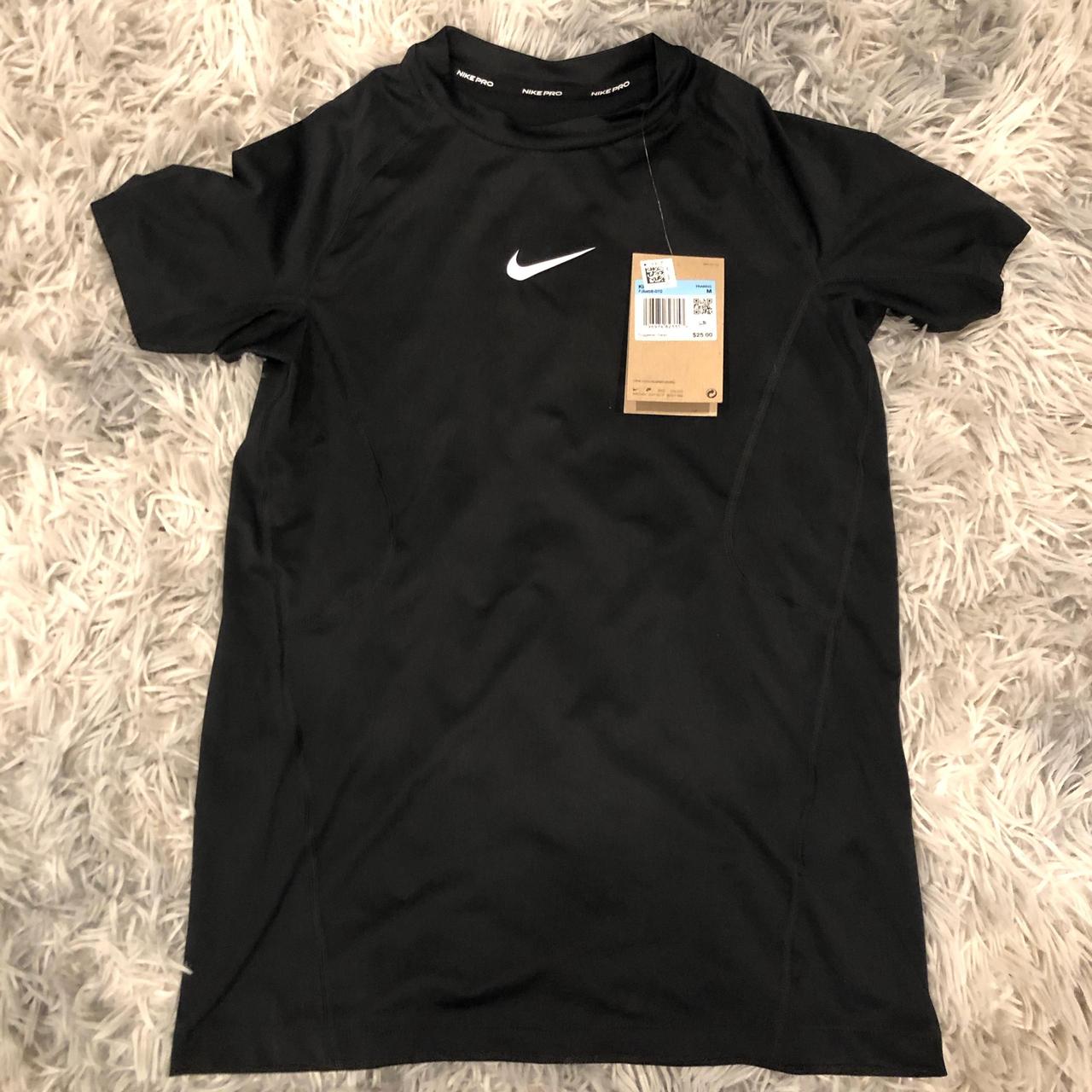 Nike black Dri-Fit compression shirt. kids medium or... - Depop