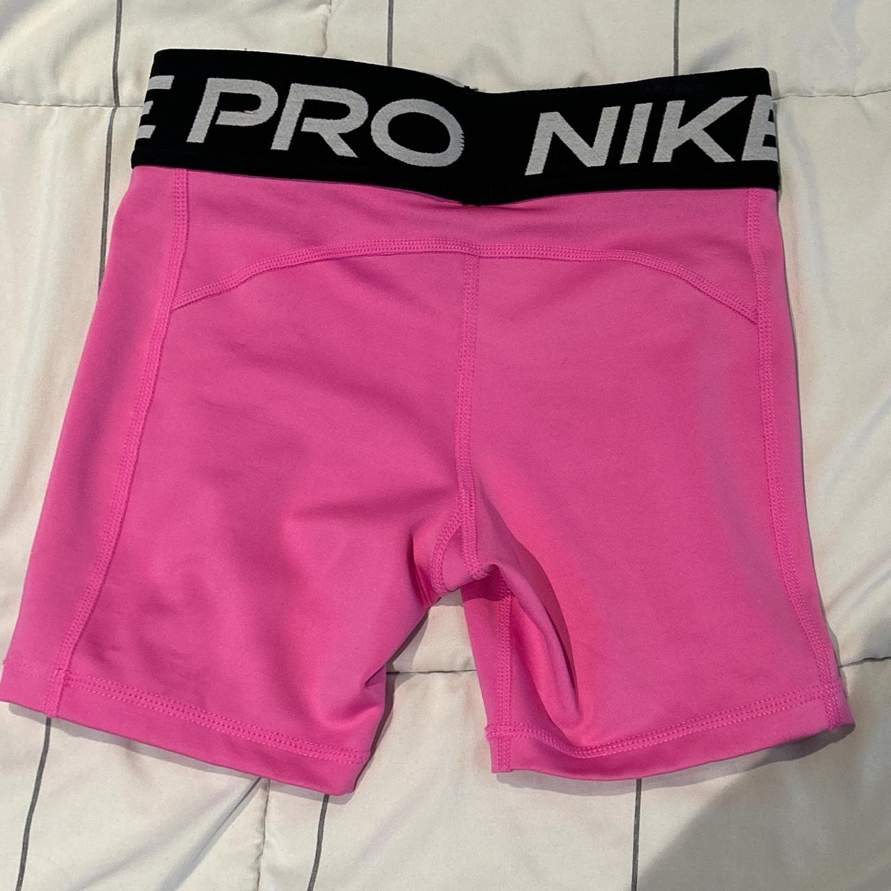 Pink Nike pro shorts #pinkshorts says size small but... - Depop