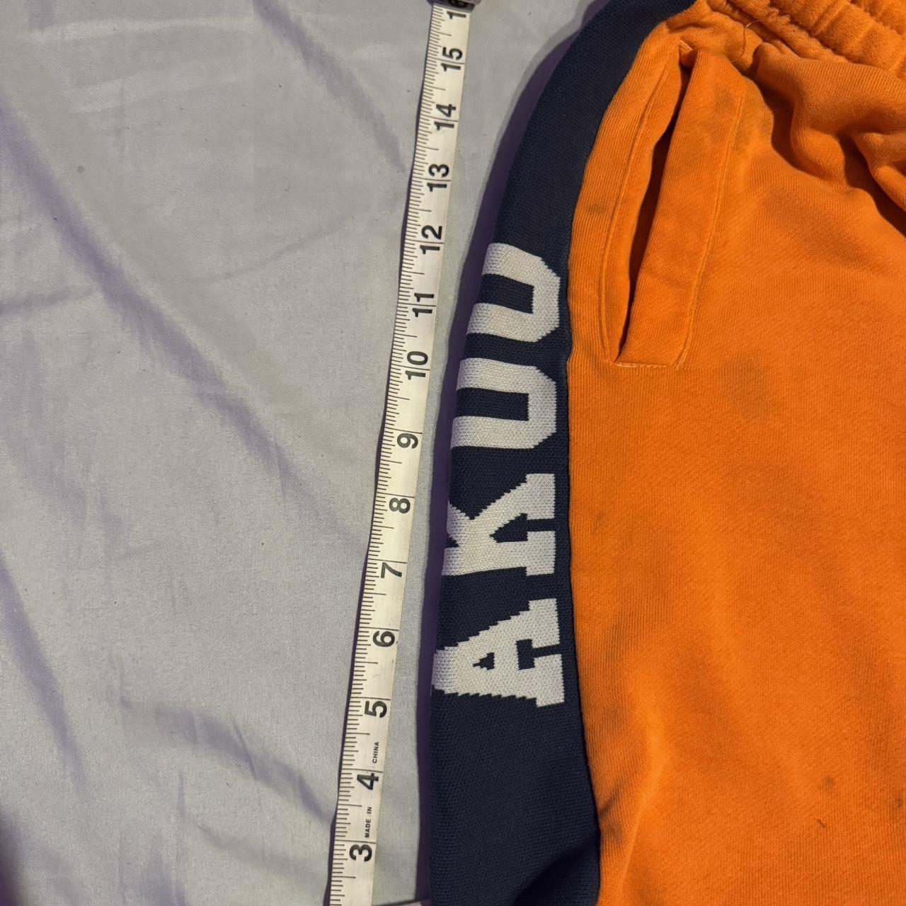 Orange akoo shorts | Depop