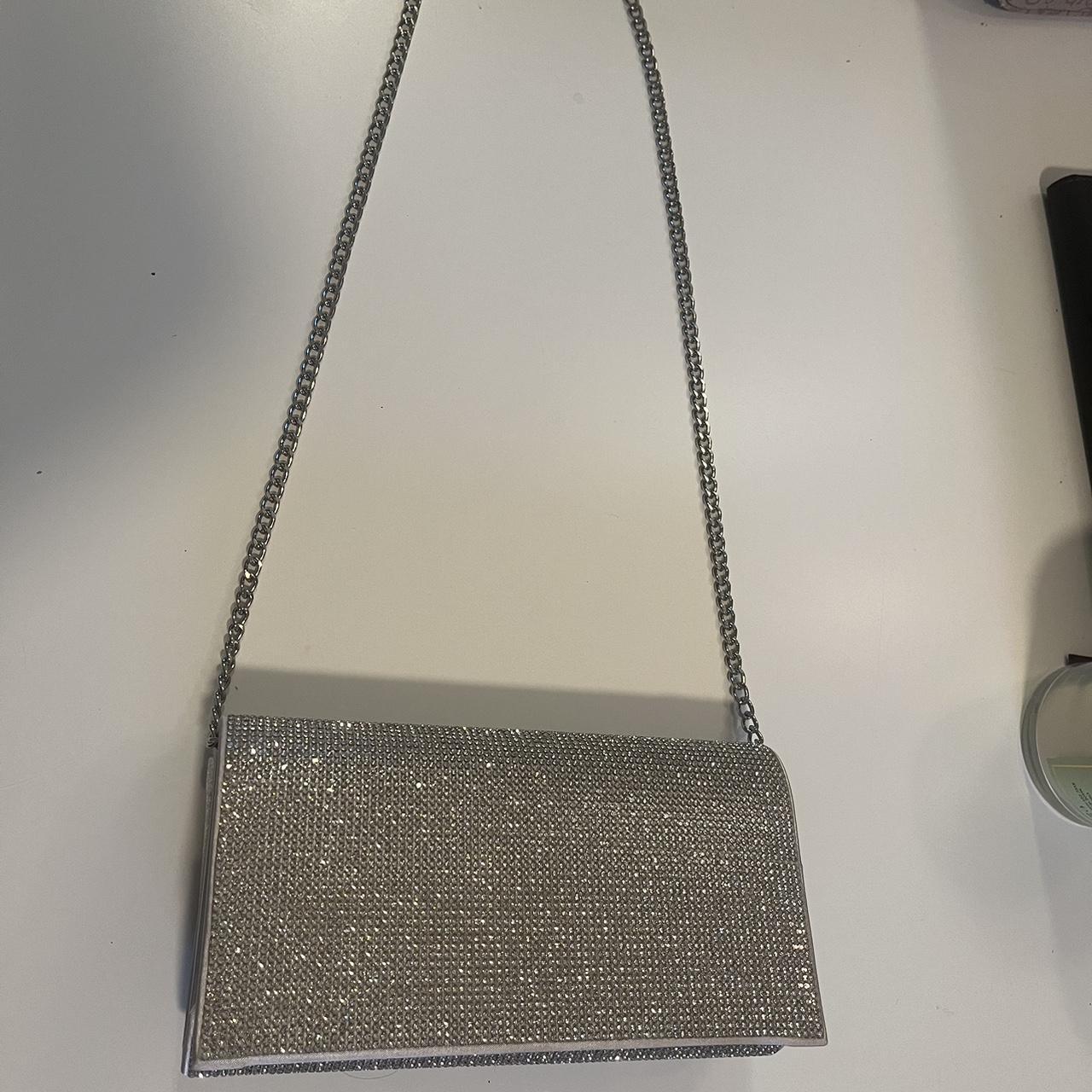 Silver rhinestone clutch bag with chain strap, used... - Depop