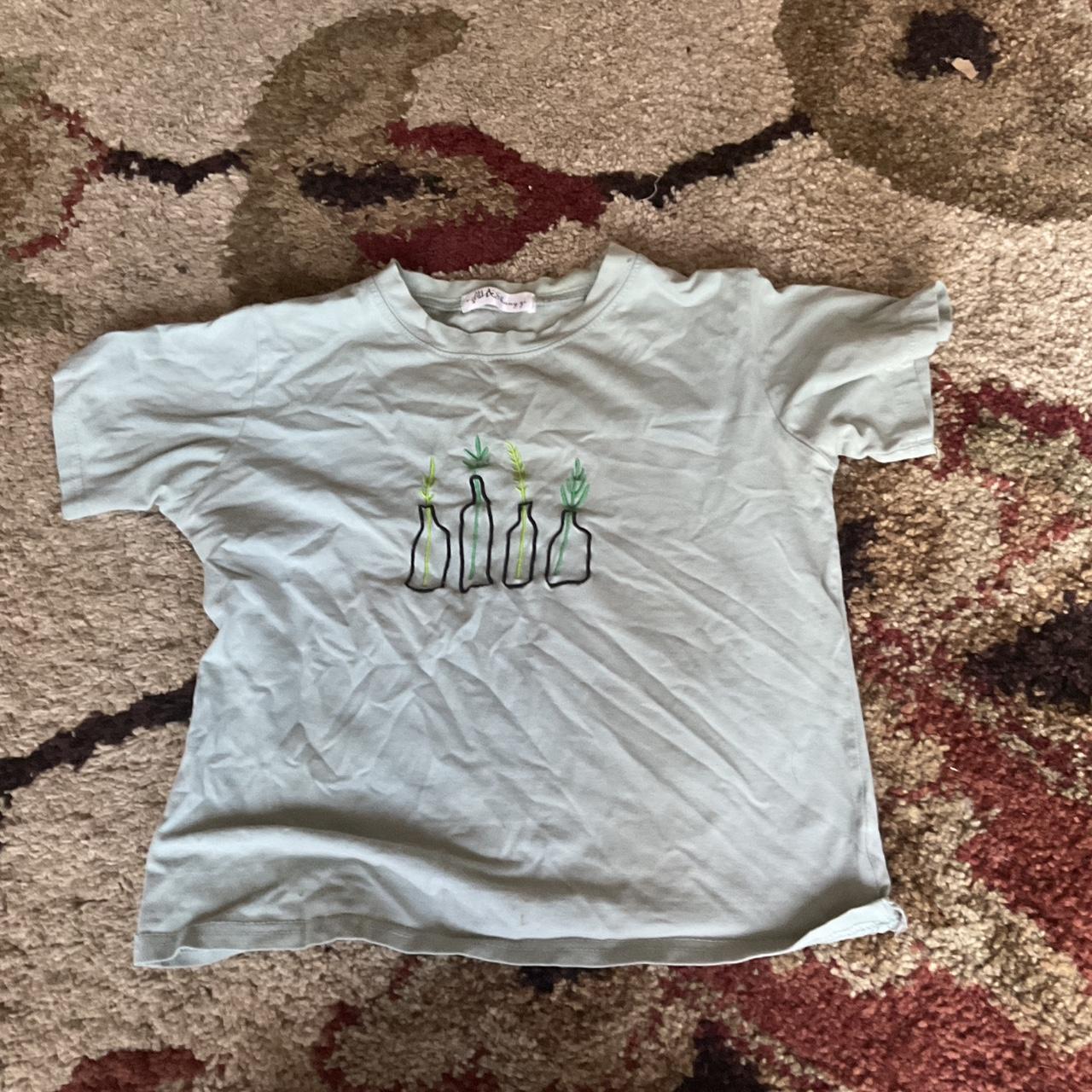 green shang yi bottles plant baby tee #babytee | Depop