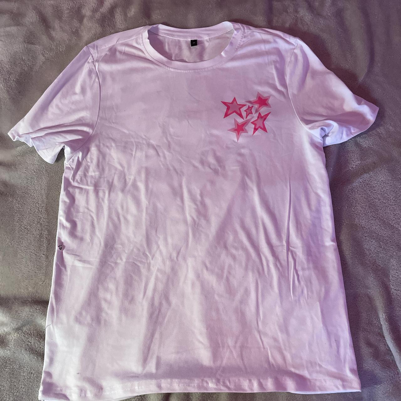 white and pink star shirt, says XS but fits like a... - Depop