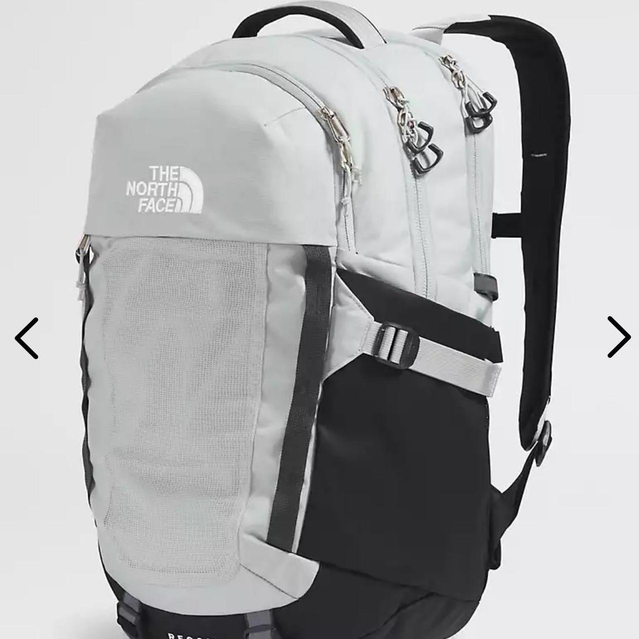 The North Face grey and white backpack. Color - Tin... - Depop