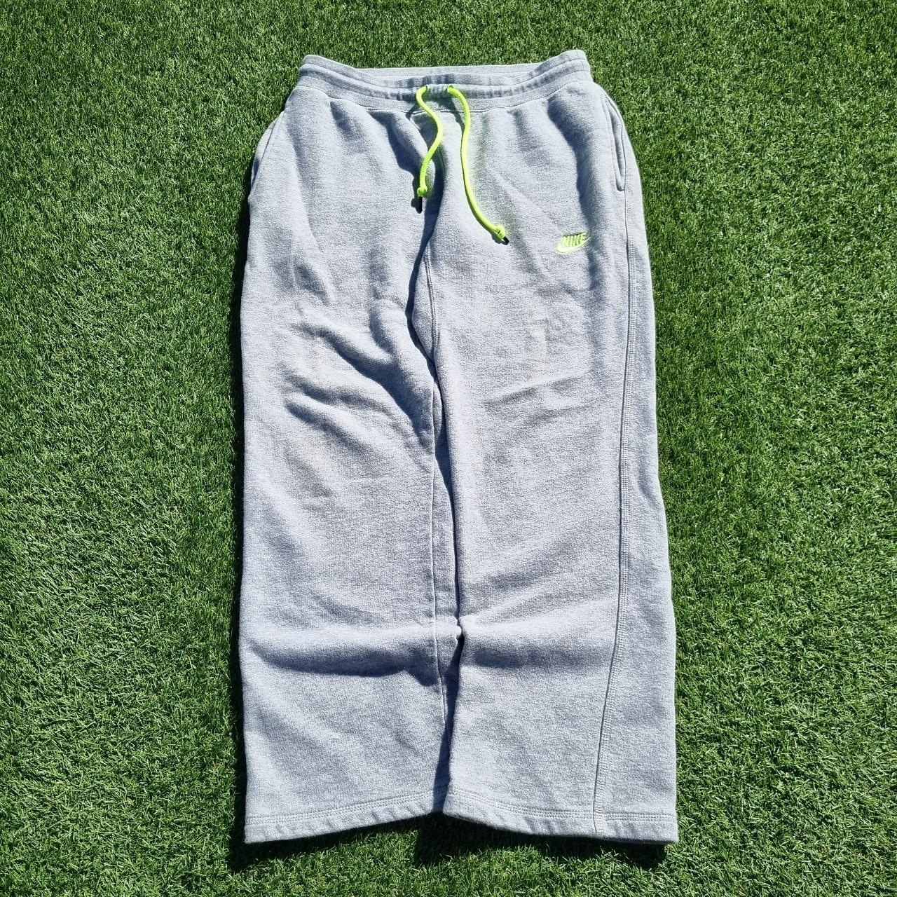 sick grey and fluro nike sweatpants, size XL womens.... | Depop