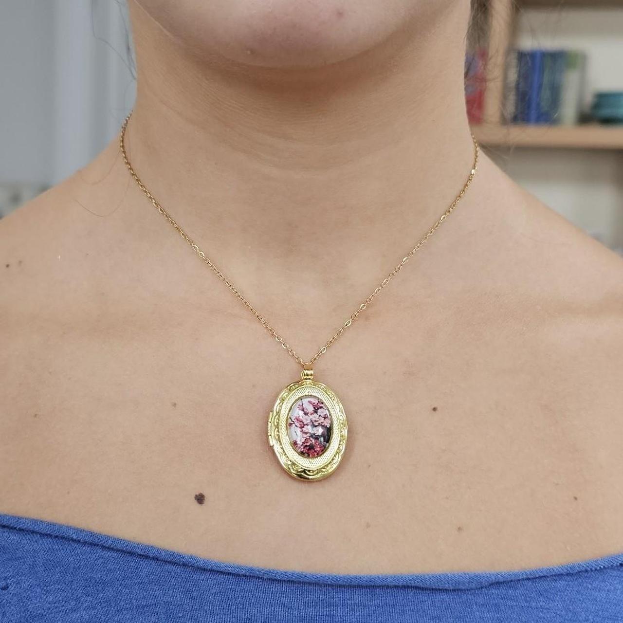 Vintage style goldtone locket with glass stone of... | Depop