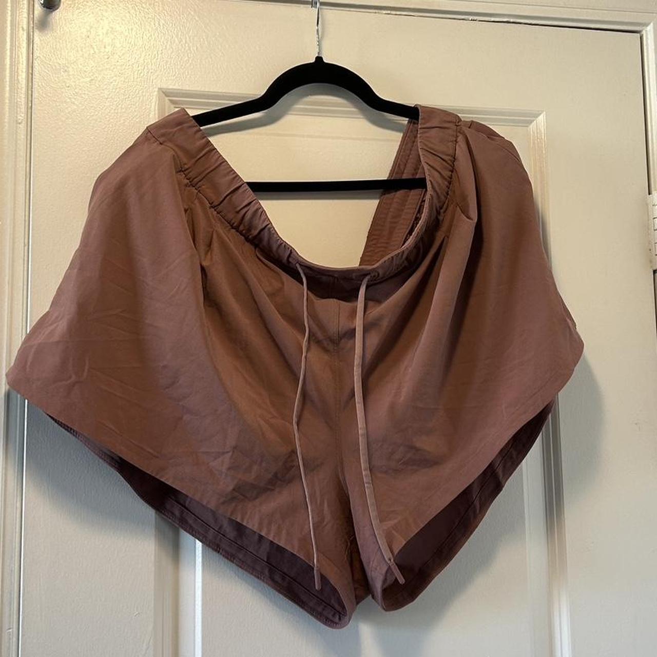 Dusty rose colored lululemon running shorts - Depop