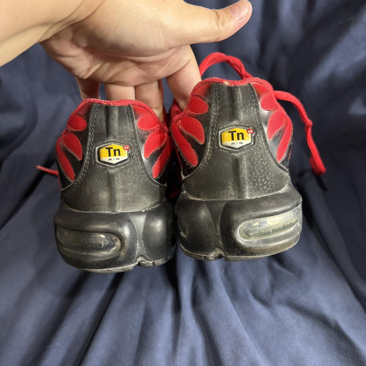 Nike Air Max Plus TN trainers in black and red. Wear... - Depop