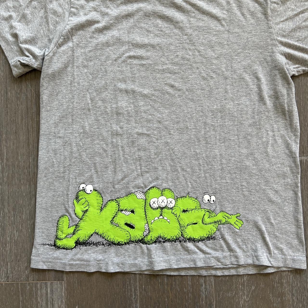 2016 KAWS x Uniqlo XX graphic single stitch tee... - Depop