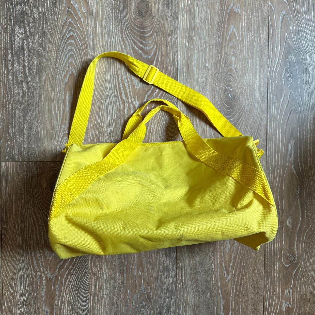 Yellow Glossier duffle bag with removable shoulder... | Depop