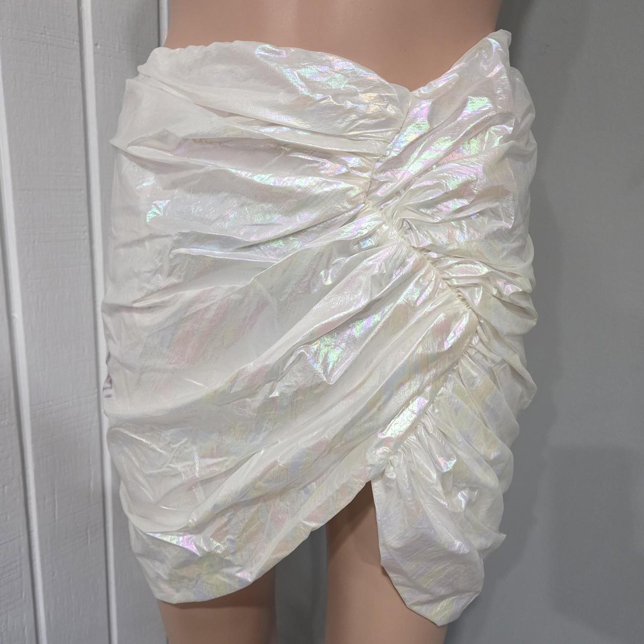 White holographic mini skirt some black marks on... | Depop