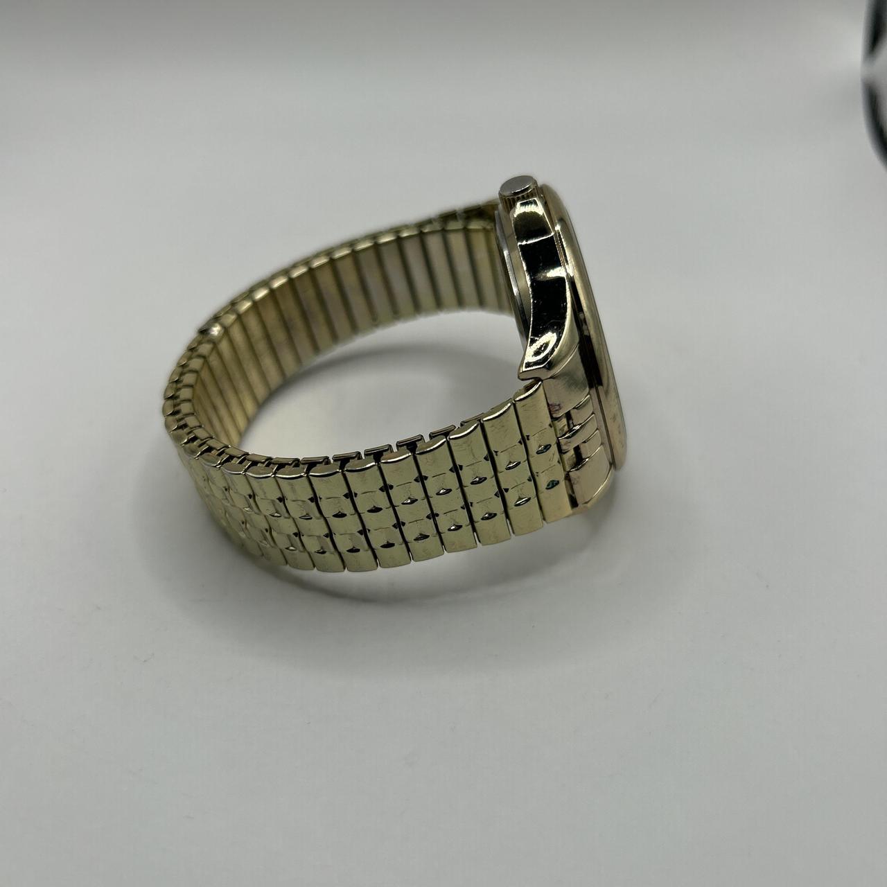 George Men's Gold-Tone Expansion Watch - Depop