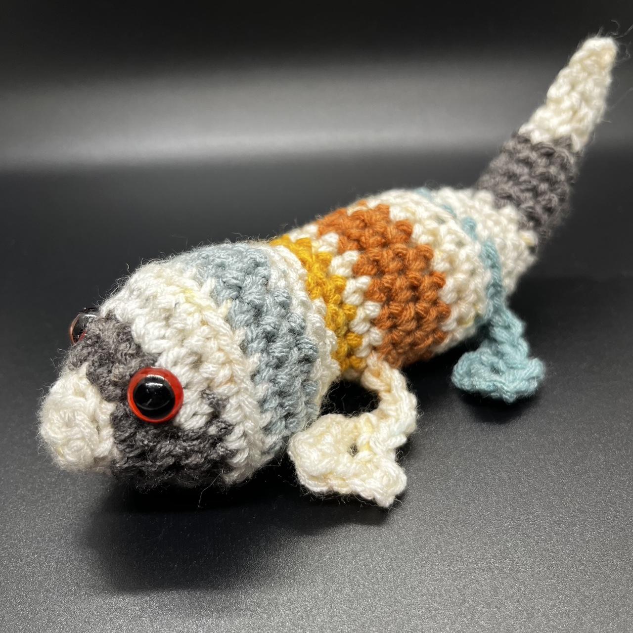 A crocheted lizard that I made named Jameson. He is... - Depop