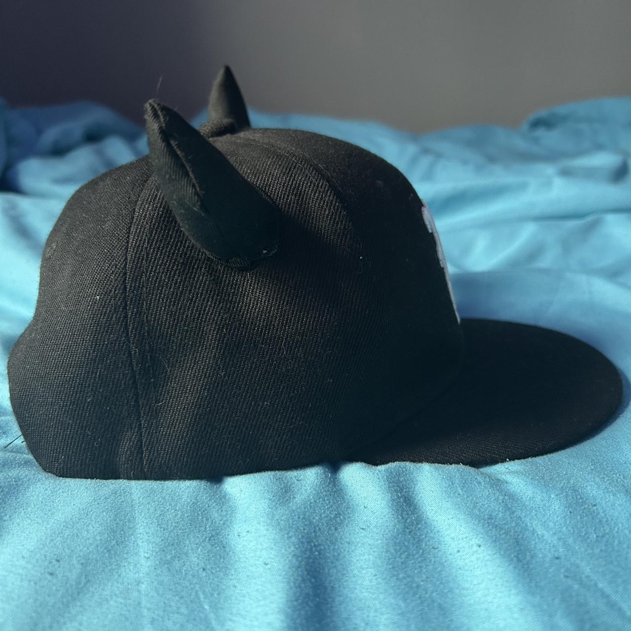 Black adjustable cap with horns - Depop