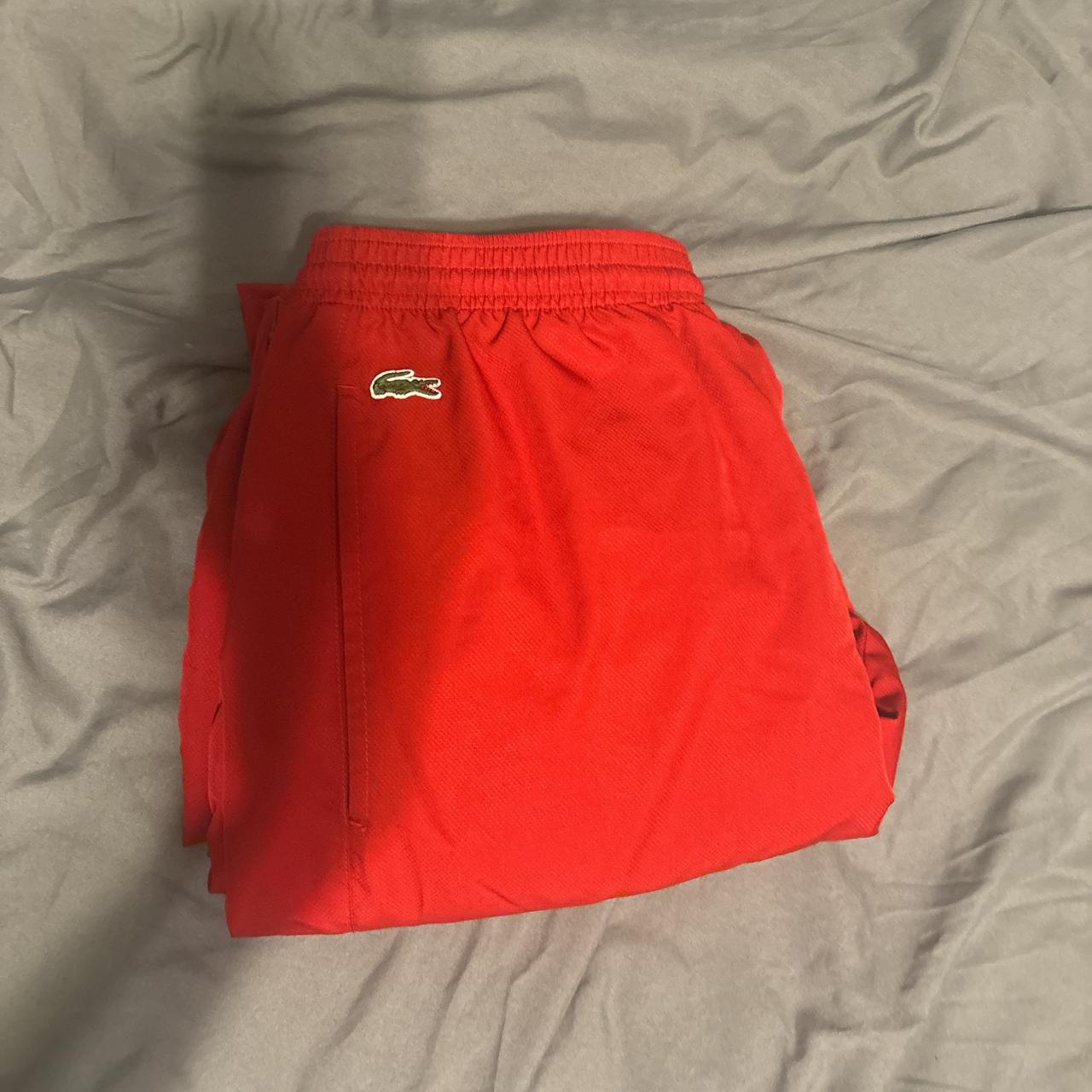 Og red Lacoste bottoms Size large excellent... - Depop