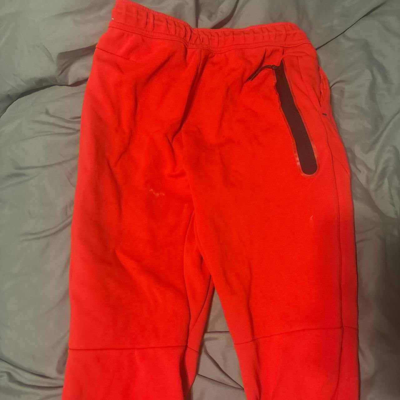 Red tech fleece trousers size medium really good... - Depop