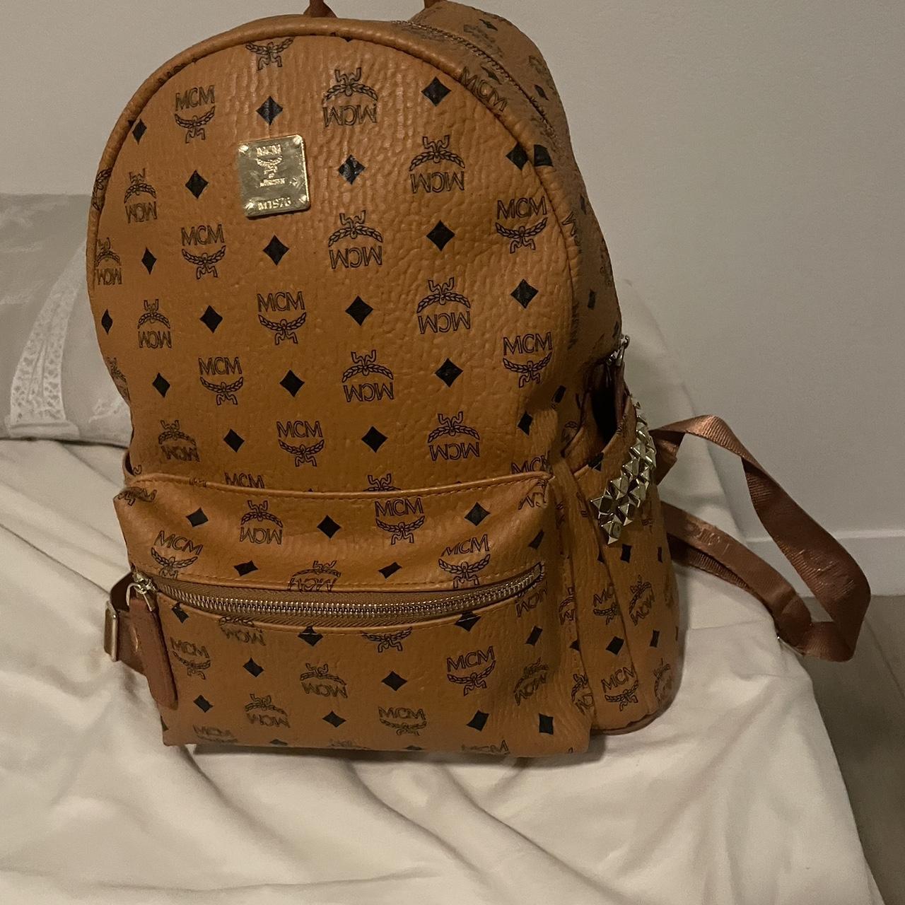 MCM brown and black leather backpack #leatherbackpack - Depop