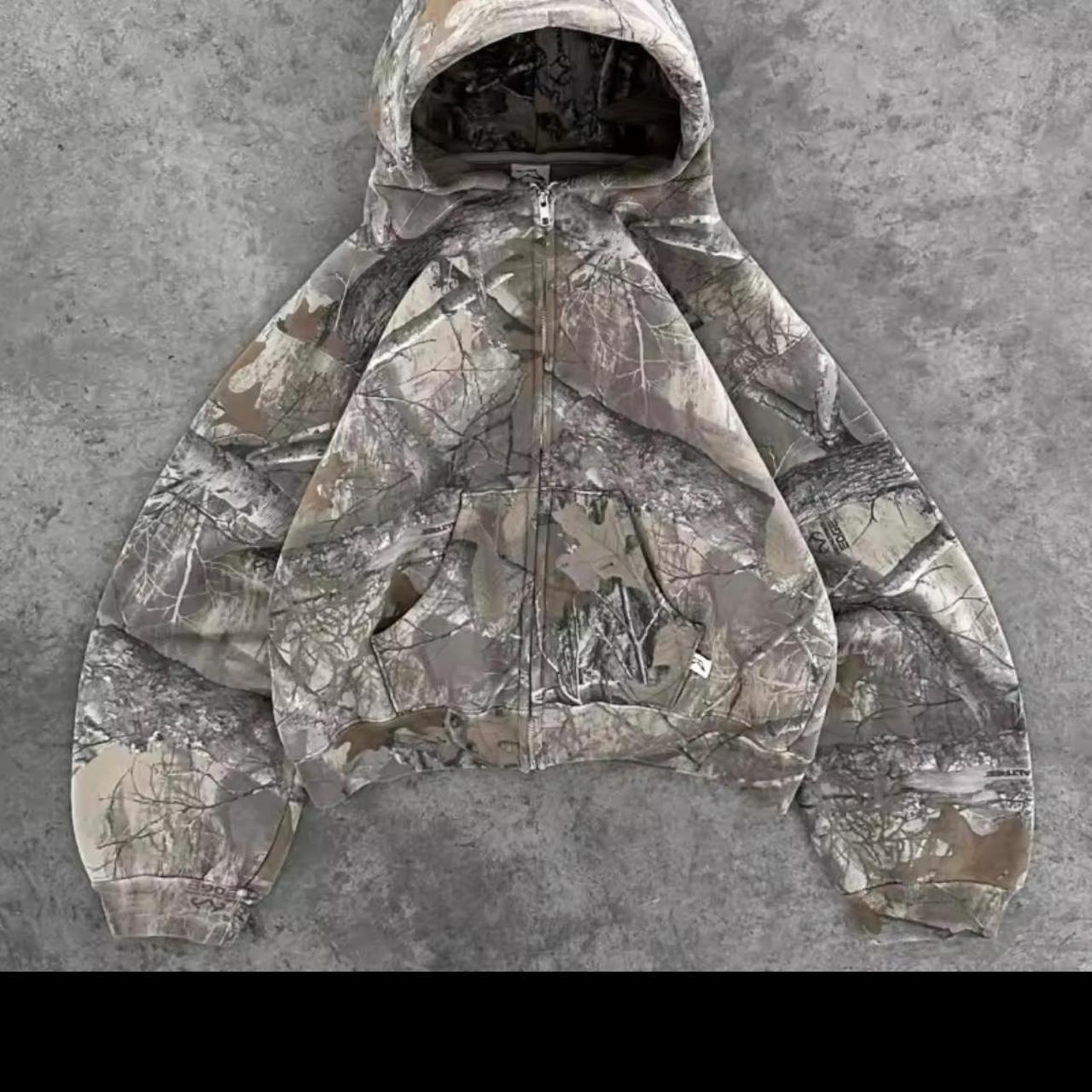 Realtree camo jacket with a hood, featuring a... - Depop