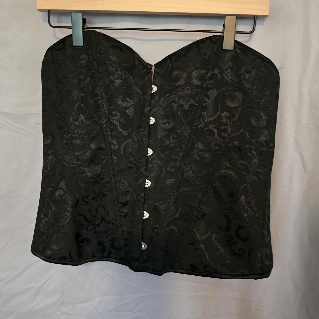 Black hook front ribbon corset with floral design in... - Depop