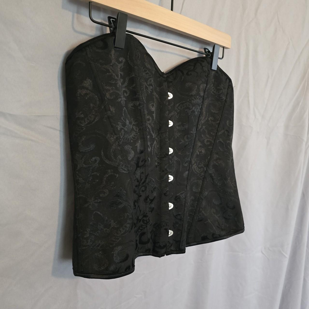 Black hook front ribbon corset with floral design in... - Depop