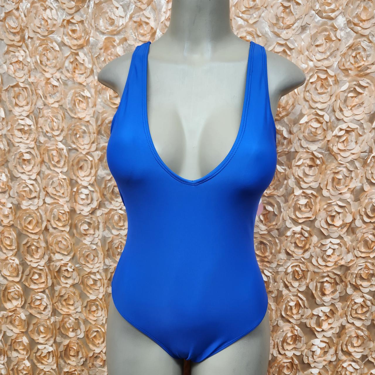 This stunning one-piece swimsuit features a... - Depop