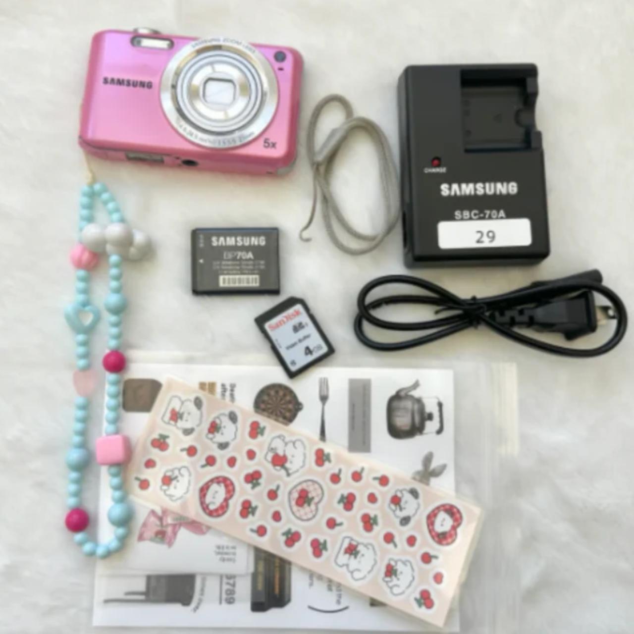 Samsung pink ES65 digital camera 👉 Visit my bio for... - Depop
