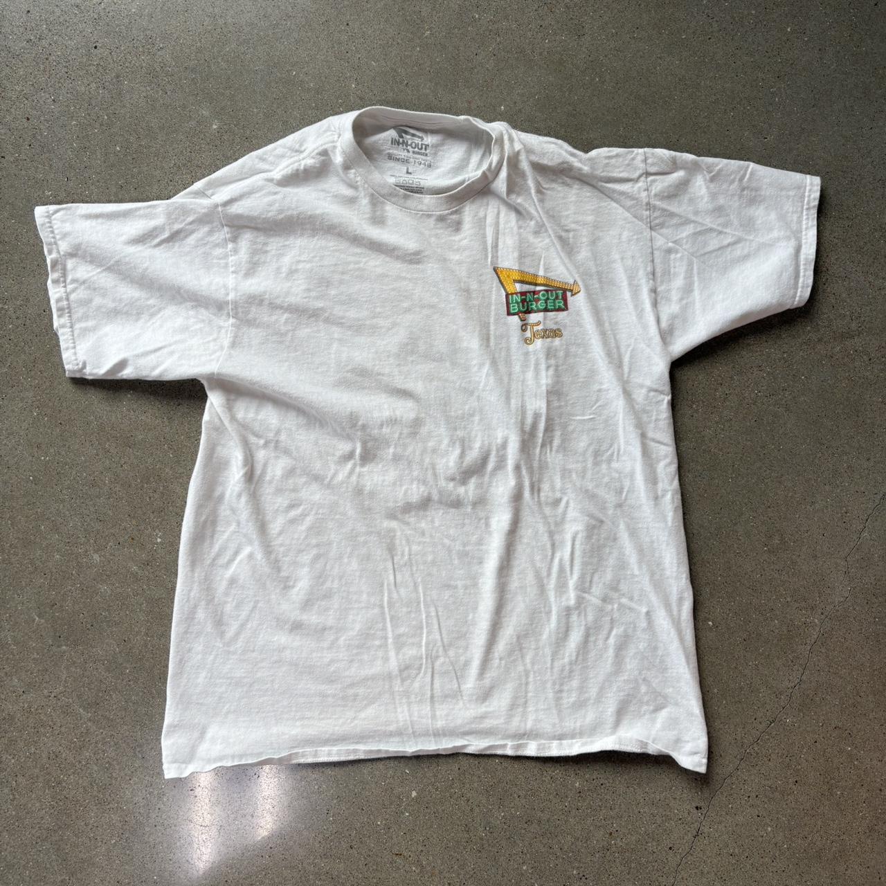 White graphic tee with a unique, faded look - Depop
