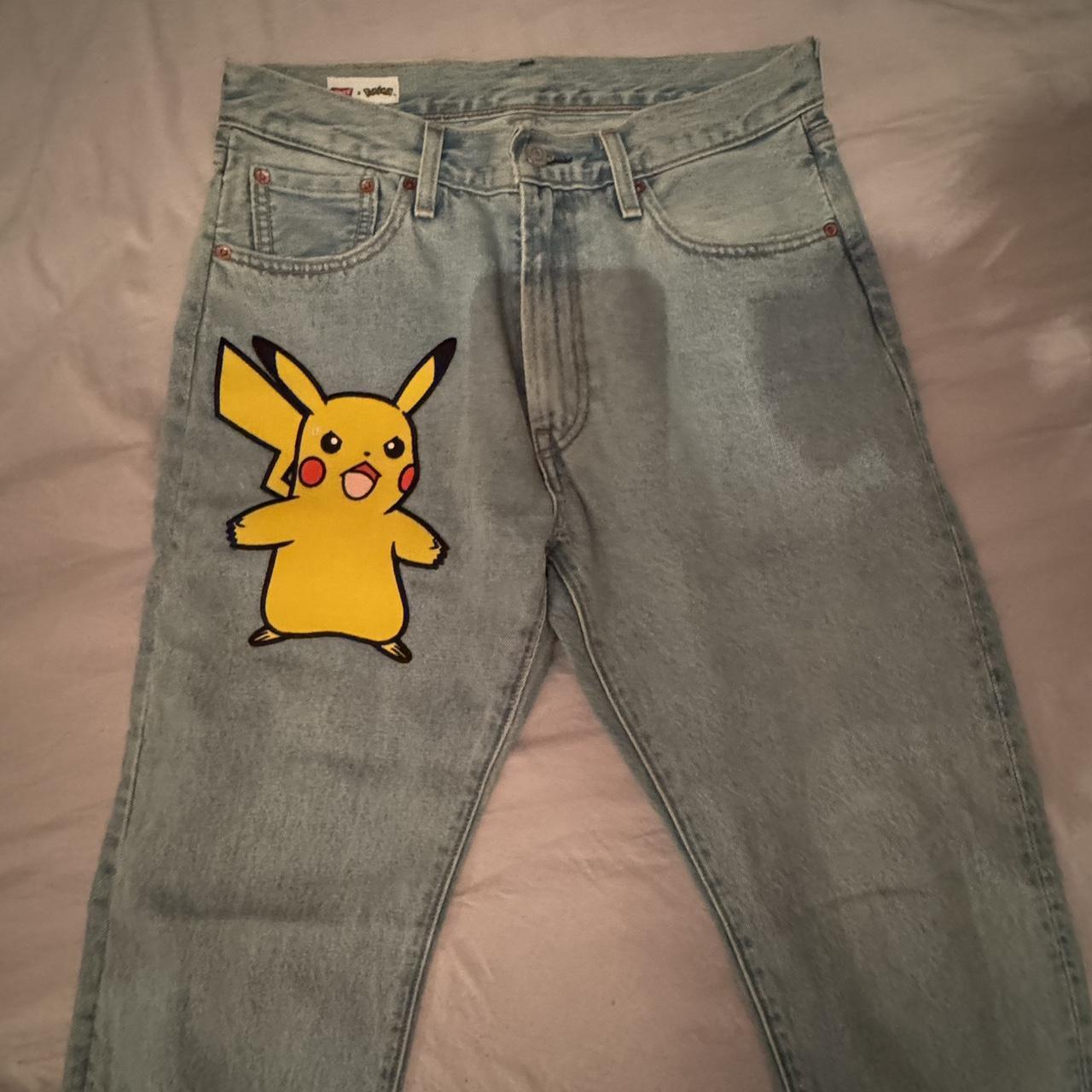 Levi's 501s with Pikachu patch, faded and distressed... - Depop