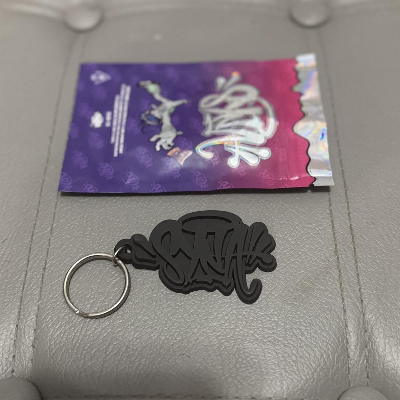 Syna World Keychain - Depop