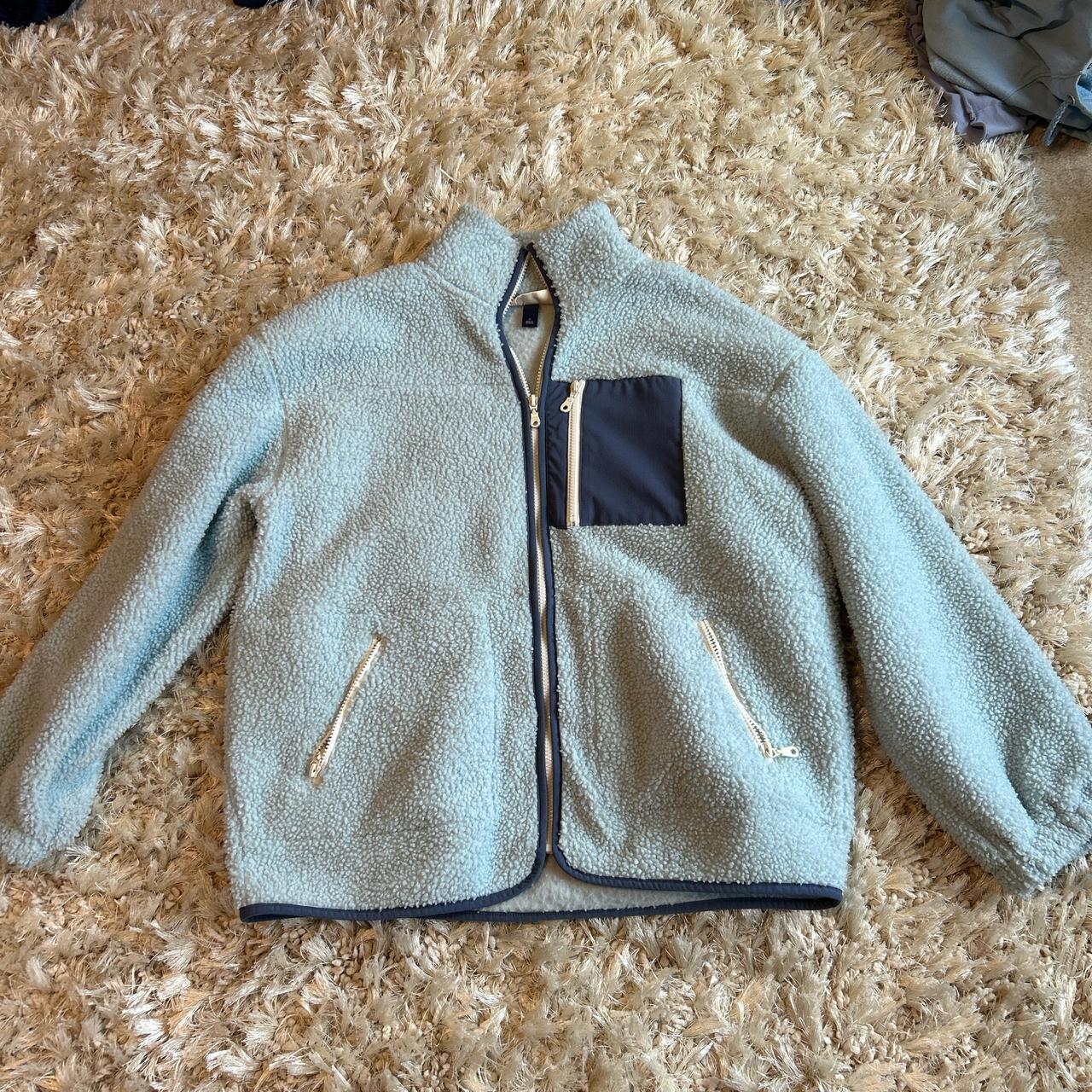 light blue fuzzy zip up, only worn once, originally $35 - Depop