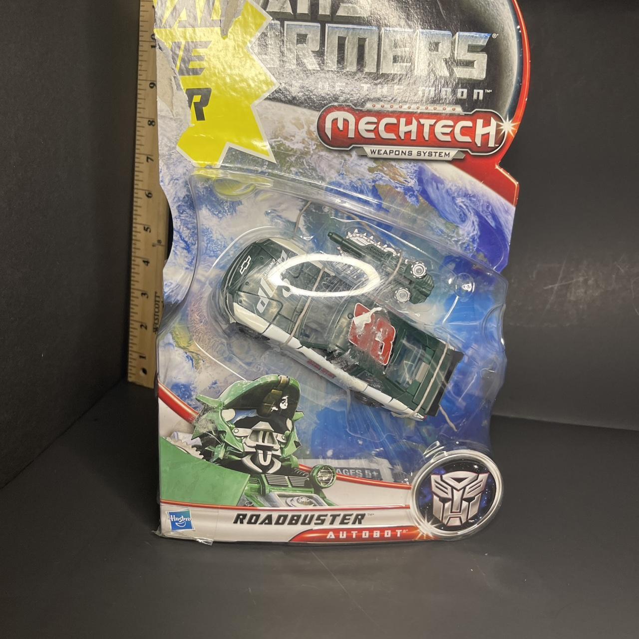 Transformers DOTM Roadbuster NASCAR seal Dale... | Depop