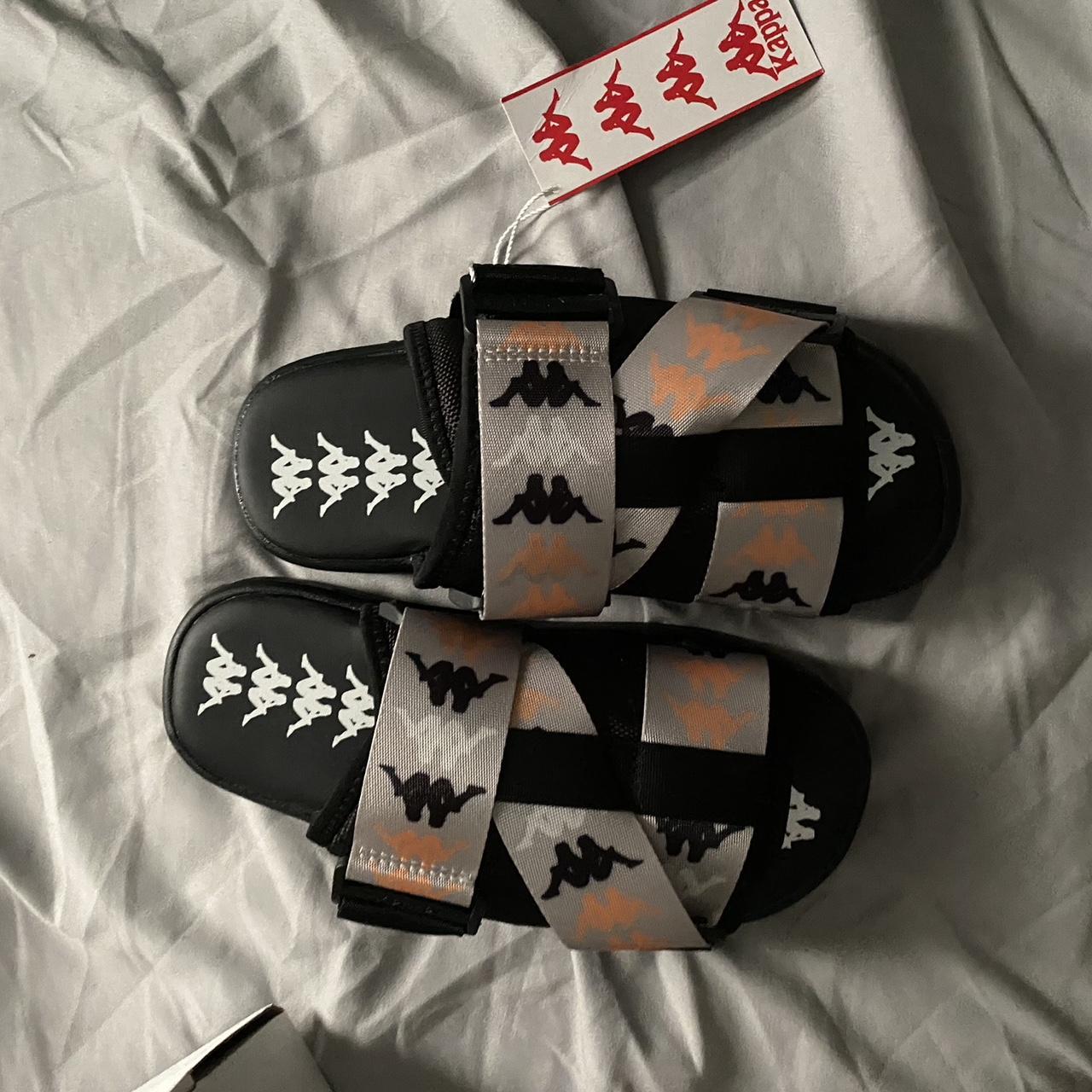 Orange and black kappa slides they are brand new... - Depop