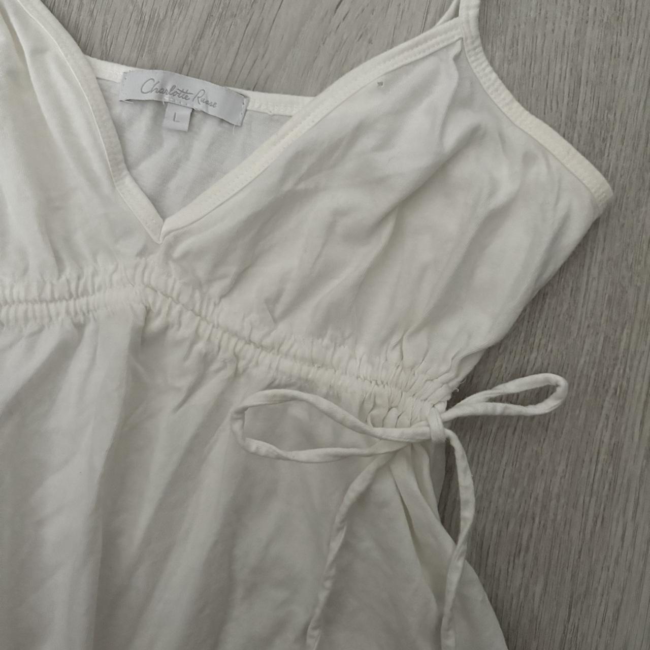 Charlotte Russe white flowy tank top with bows on... - Depop