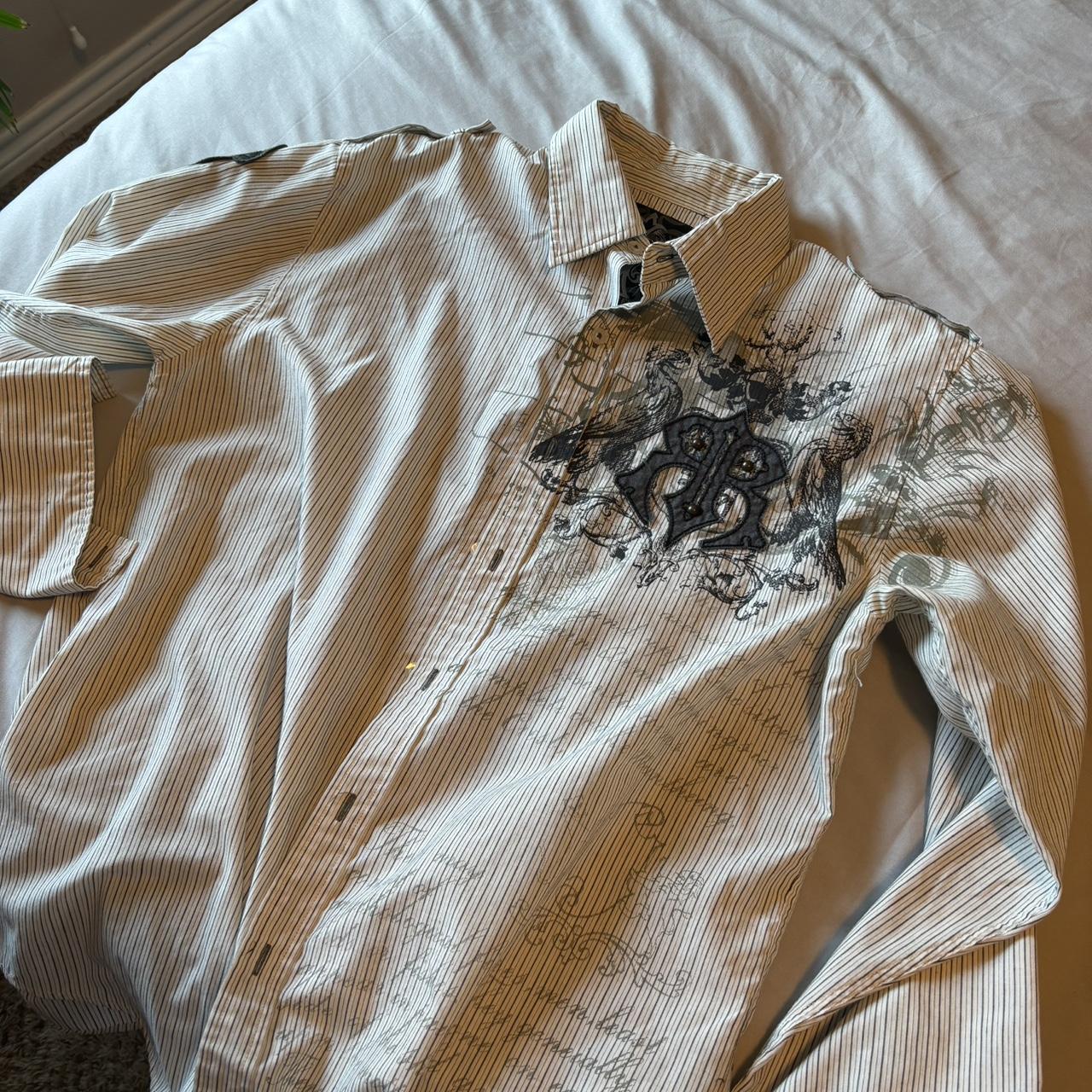 Roar White and black striped button up shirt with a... - Depop