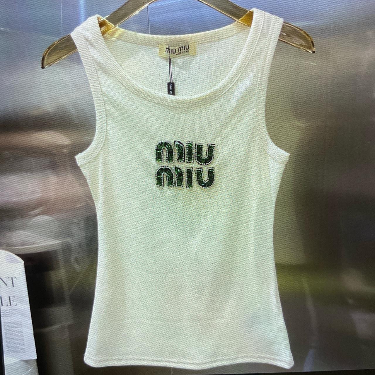 Miu Miu white tank top with green logo - Depop