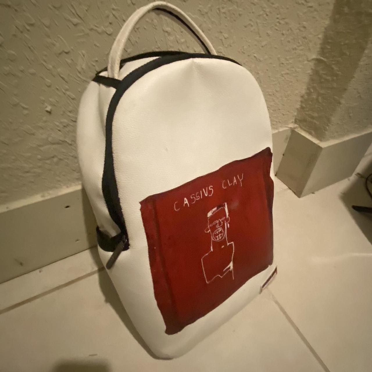 Sprayground Red and white backpack with Muhammed Ali - Depop