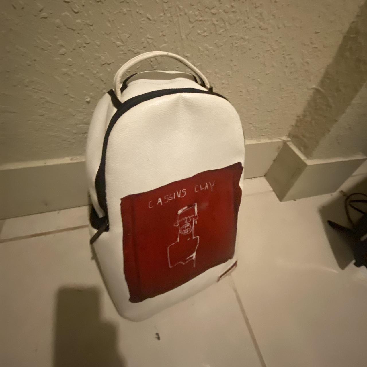Sprayground Red and white backpack with Muhammed Ali - Depop