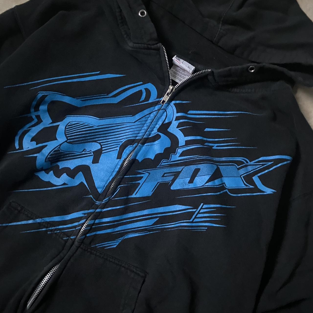 Black and blue Fox Racing zip-up hoodie perfect fit... | Depop