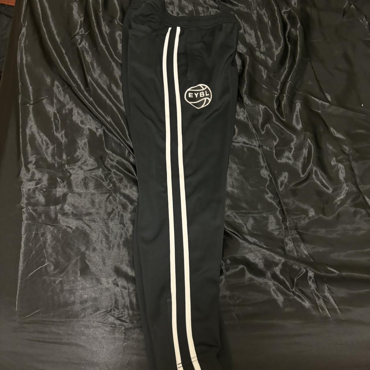EYBL black and white tracksuit bottoms - Depop